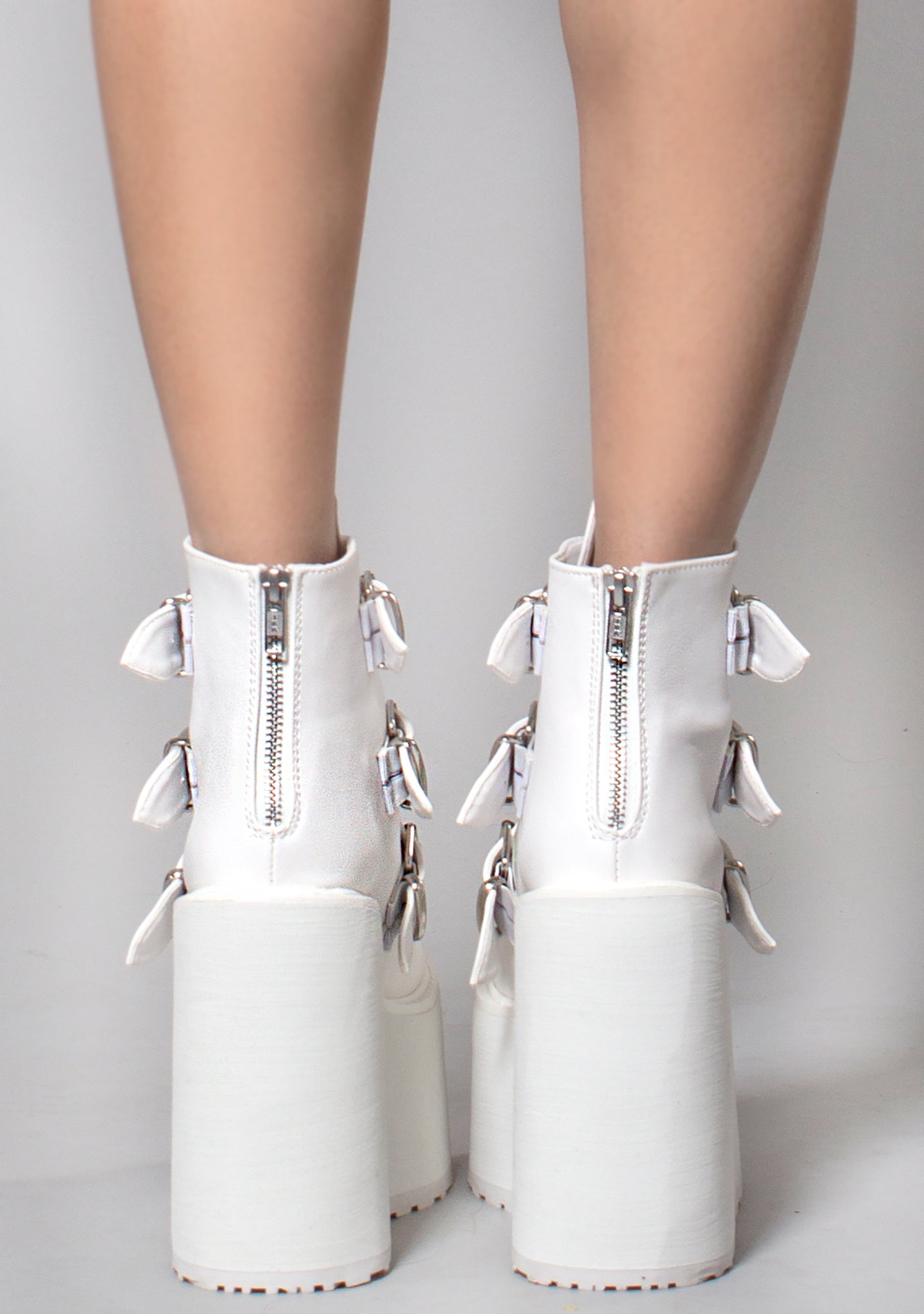 Shop Demonia Swing Strapped Platform Boots in White at LAStyleRush.com ...